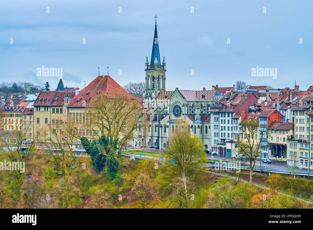 Medieval townhouses on Bern and Church of St. Peter and Paul with its ...