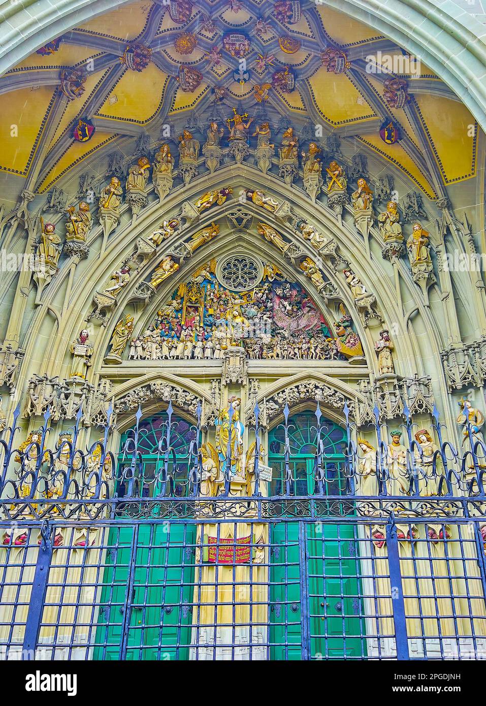 Middle Ages period entrnace Portal with stone figures of Bern Minster ...
