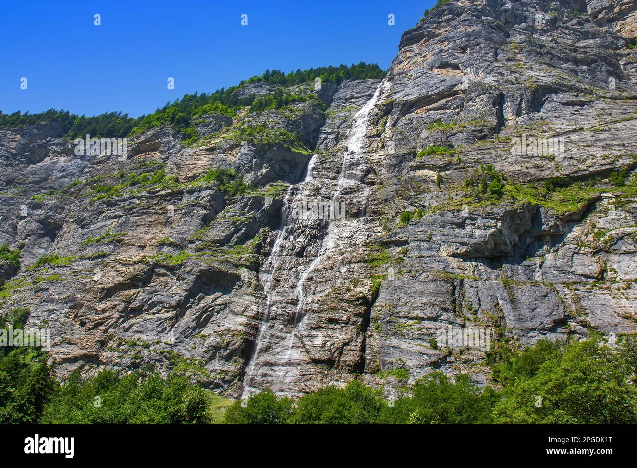 View of the great waterfall in the mountain in Swiss alps Stock Photo ...