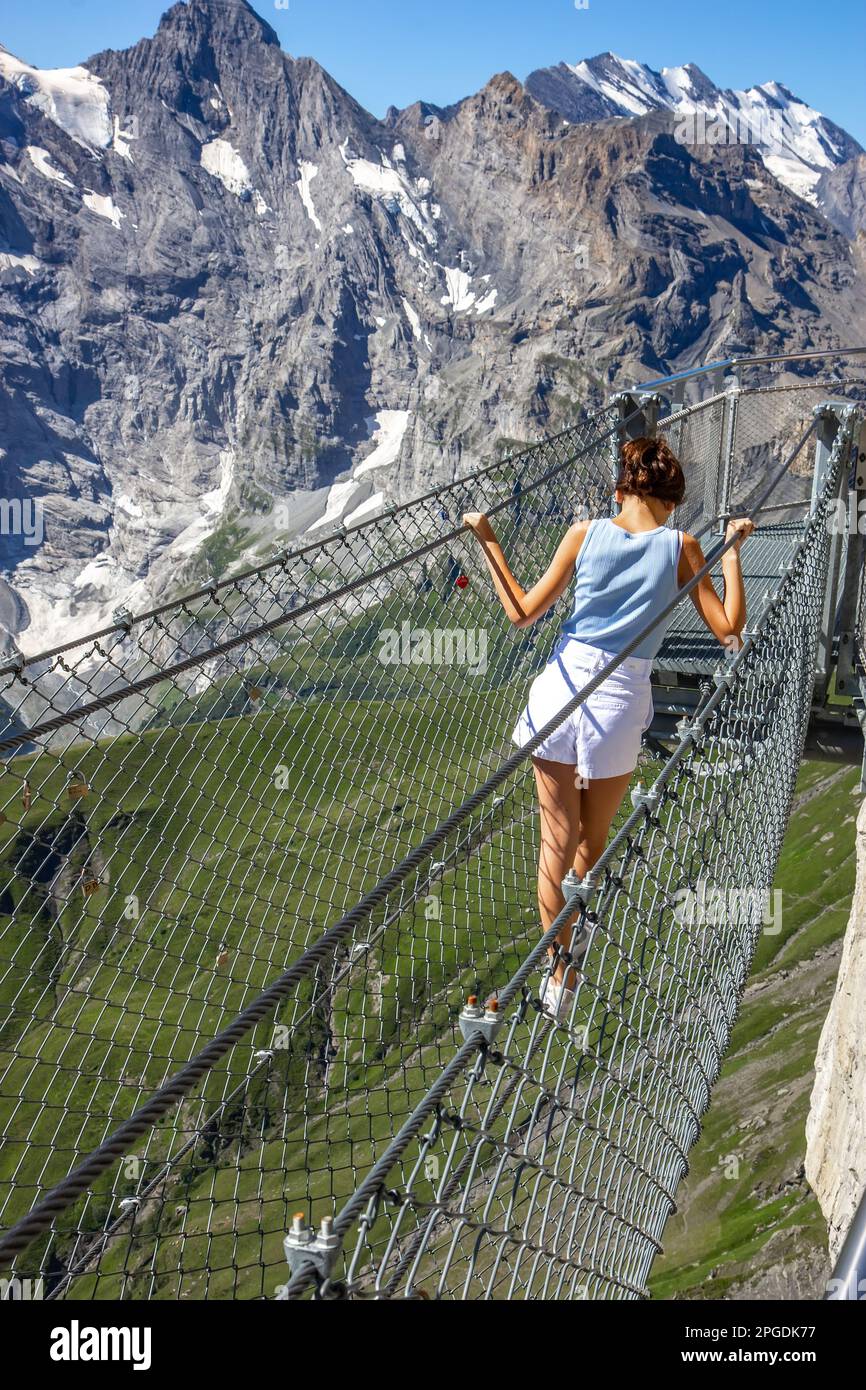 Walking on the hanging bridge in the Swiis alps Stock Photo - Alamy