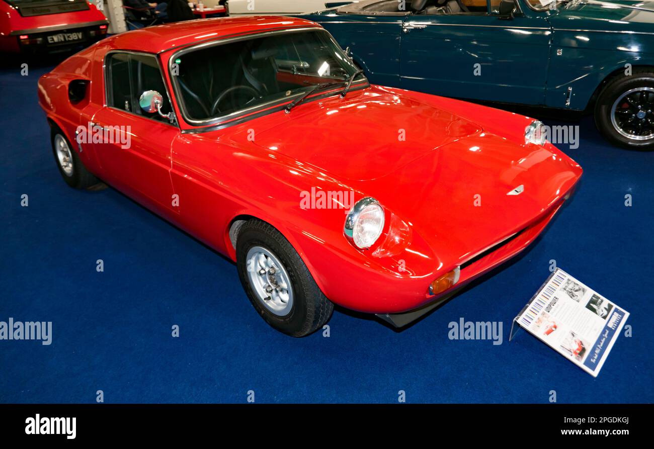 Three-quarters front view of a Red, Unipower GT, on display at the 2023 ...