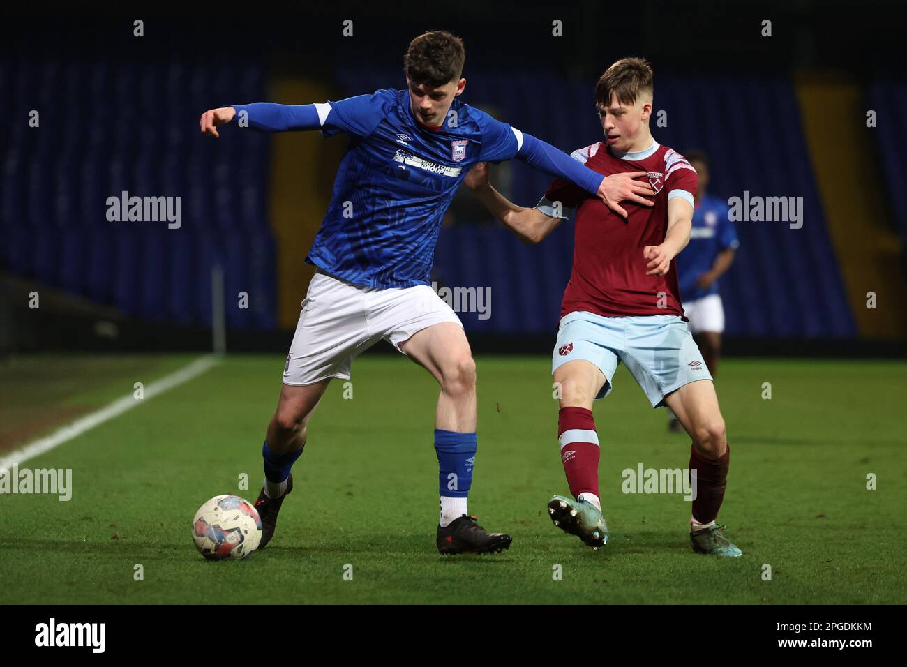 Tom Taylor of Ipswich Town and Oliver Scarles of West Ham United ...