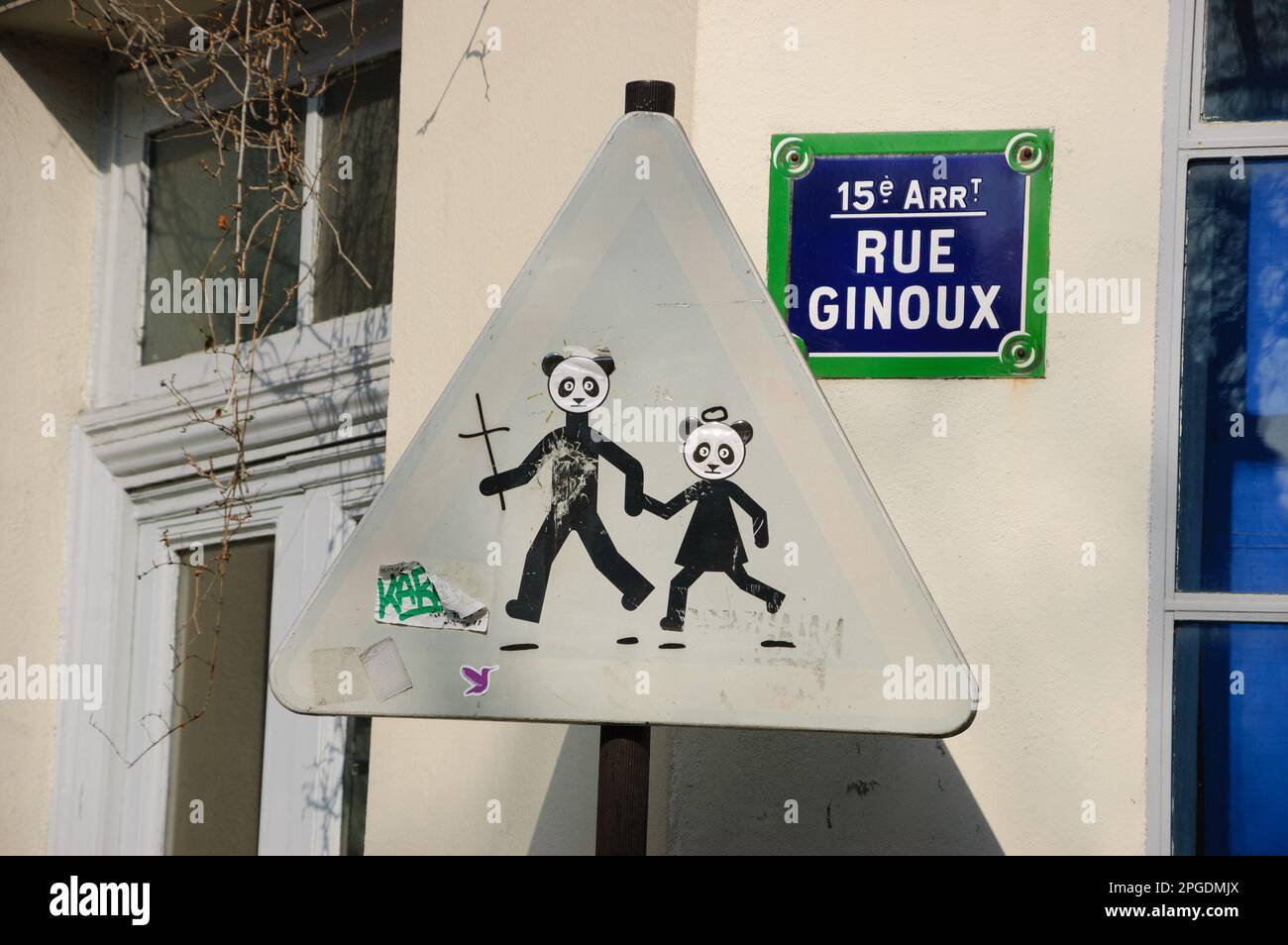 City life. Saint Panda bears crossing road. Traffic road sign Warning ...