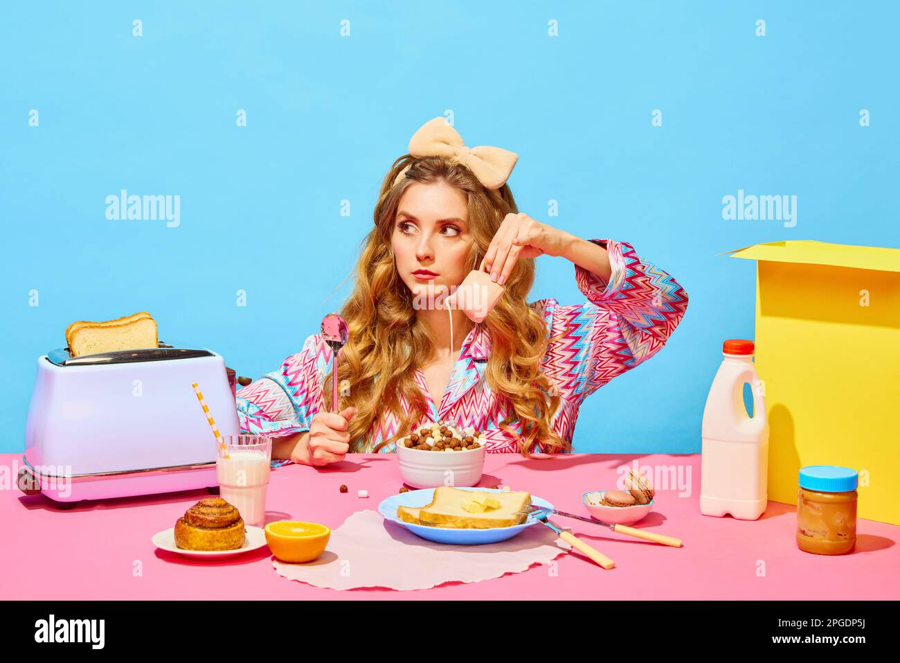 Food pop art photography. Sad young girl with long curly hair preparing ...