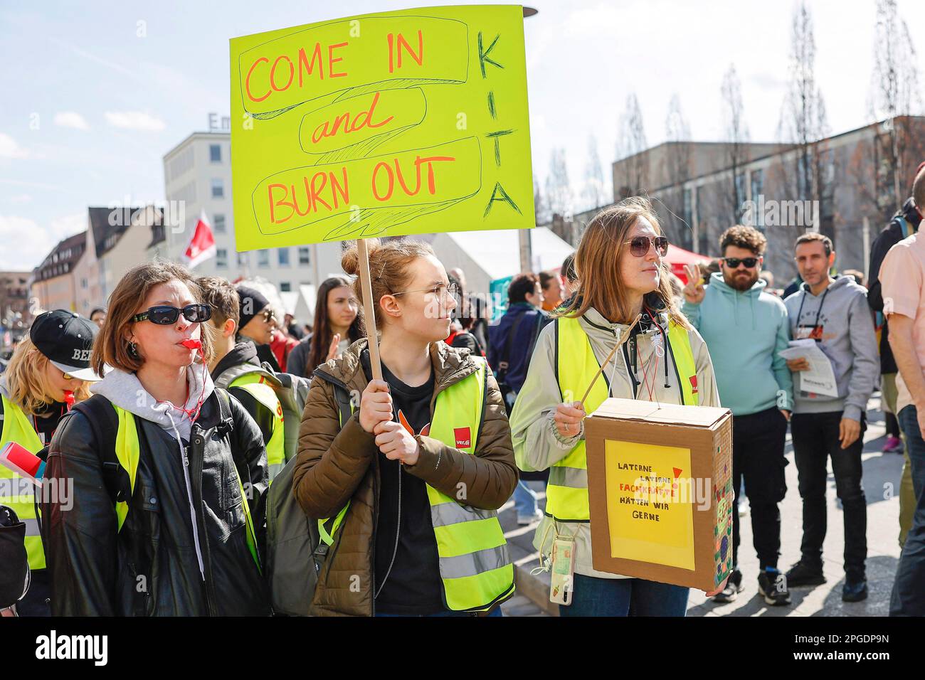 Nuremberg, Germany. 22nd Mar, 2023. Strikers hold up their protest ...