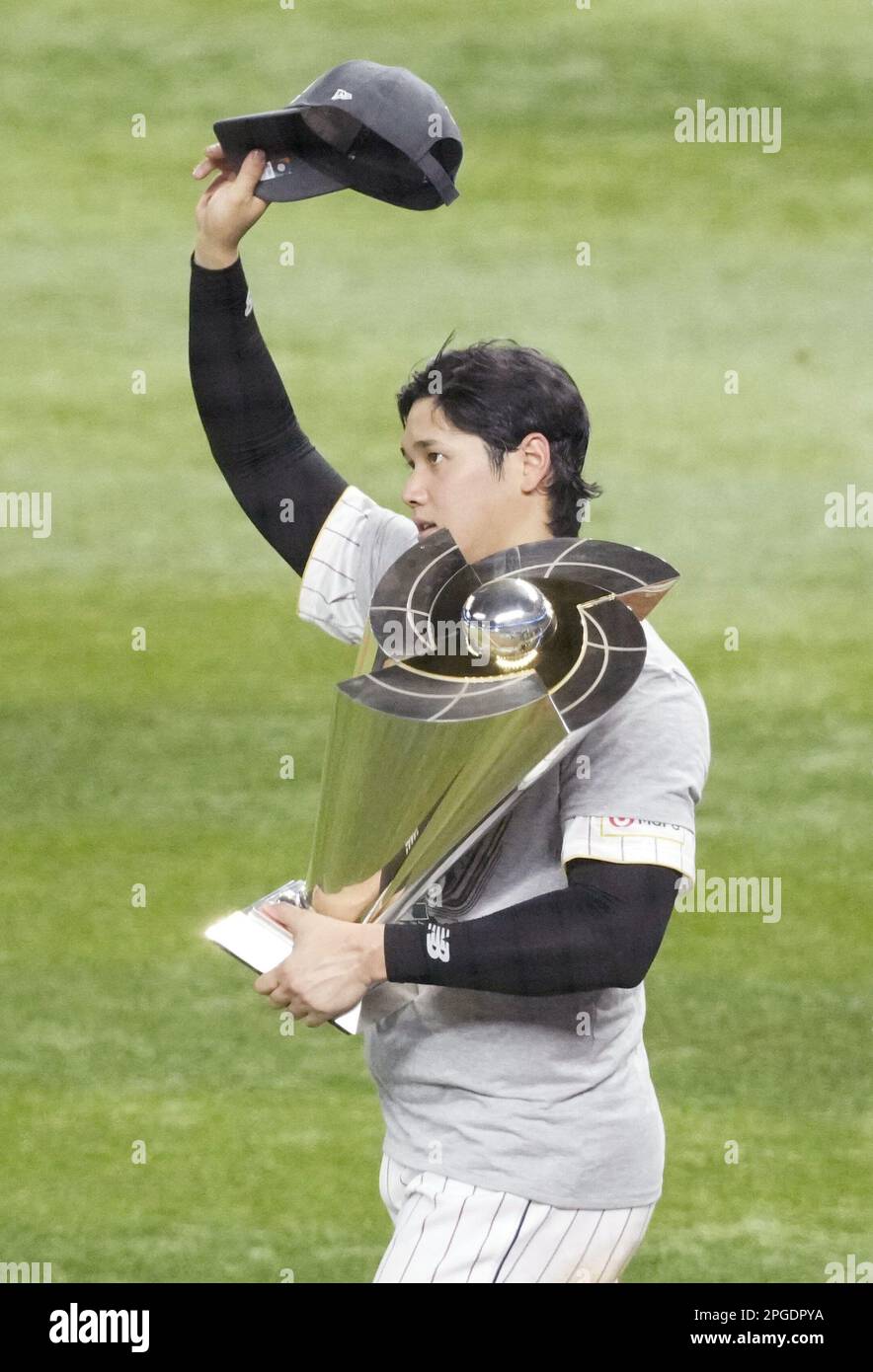 Shohei Ohtani of Japan celebrates with the victor's trophy after the ...