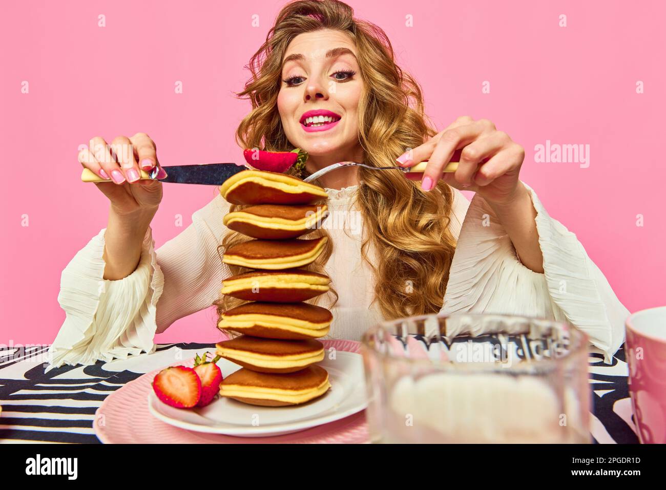 Food pop art. Adorable girl with red hair starting eat giant portion of ...