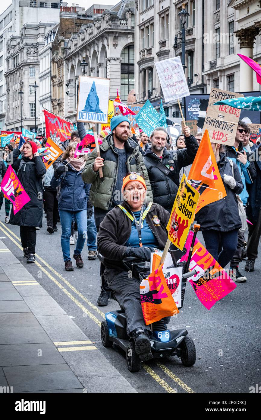 London, UK. 15th March, 2023. Disabled protester on mobility scooter at ...