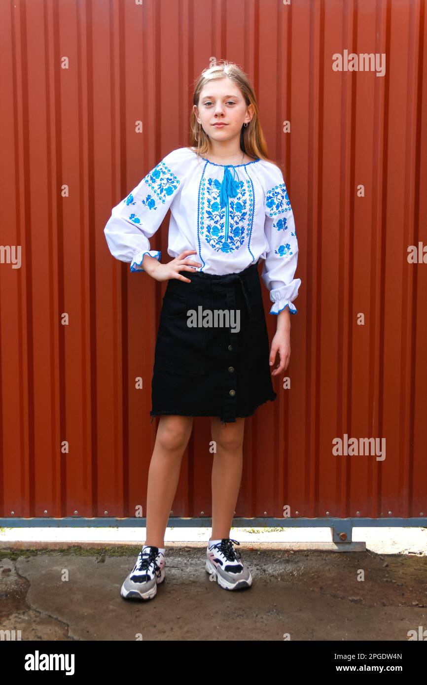 Ukraine child. Ukrainian teen girl in vyshyvanka standing outside in ...