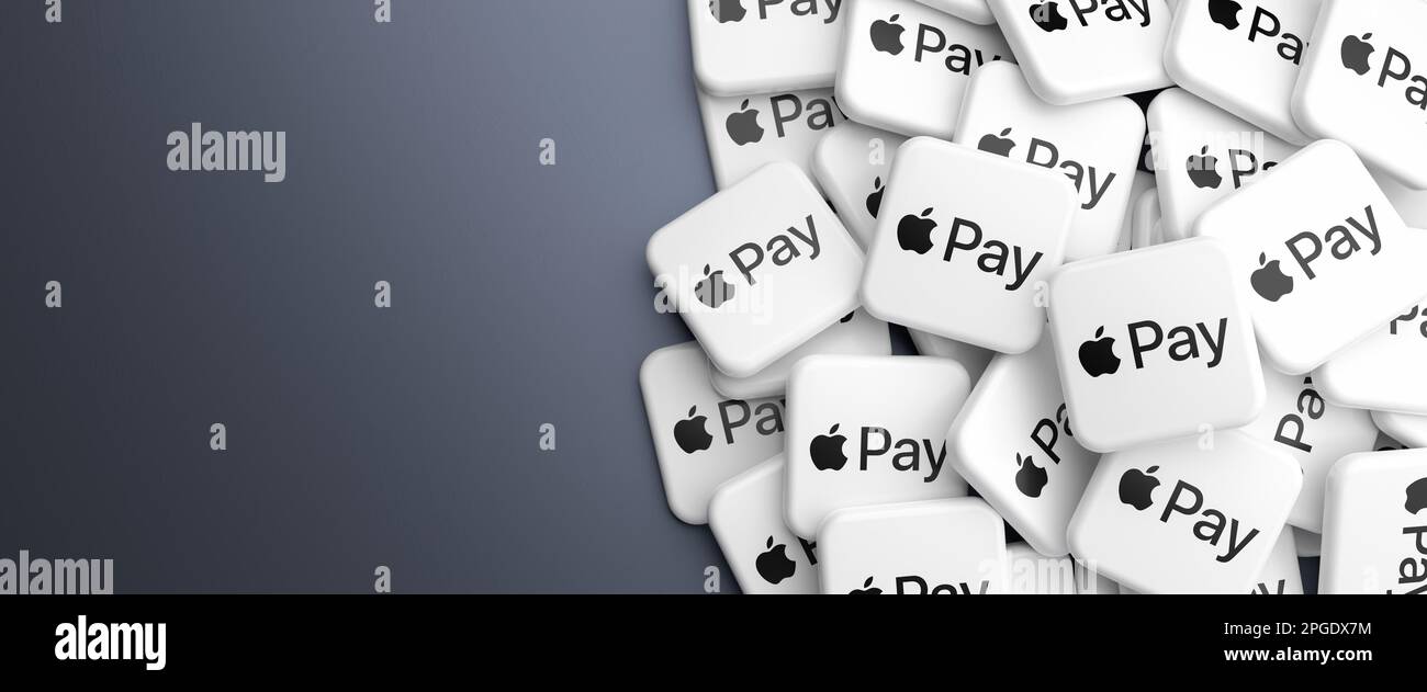Logos of the payment solution Apple Pay on heap on a table. Web banner ...