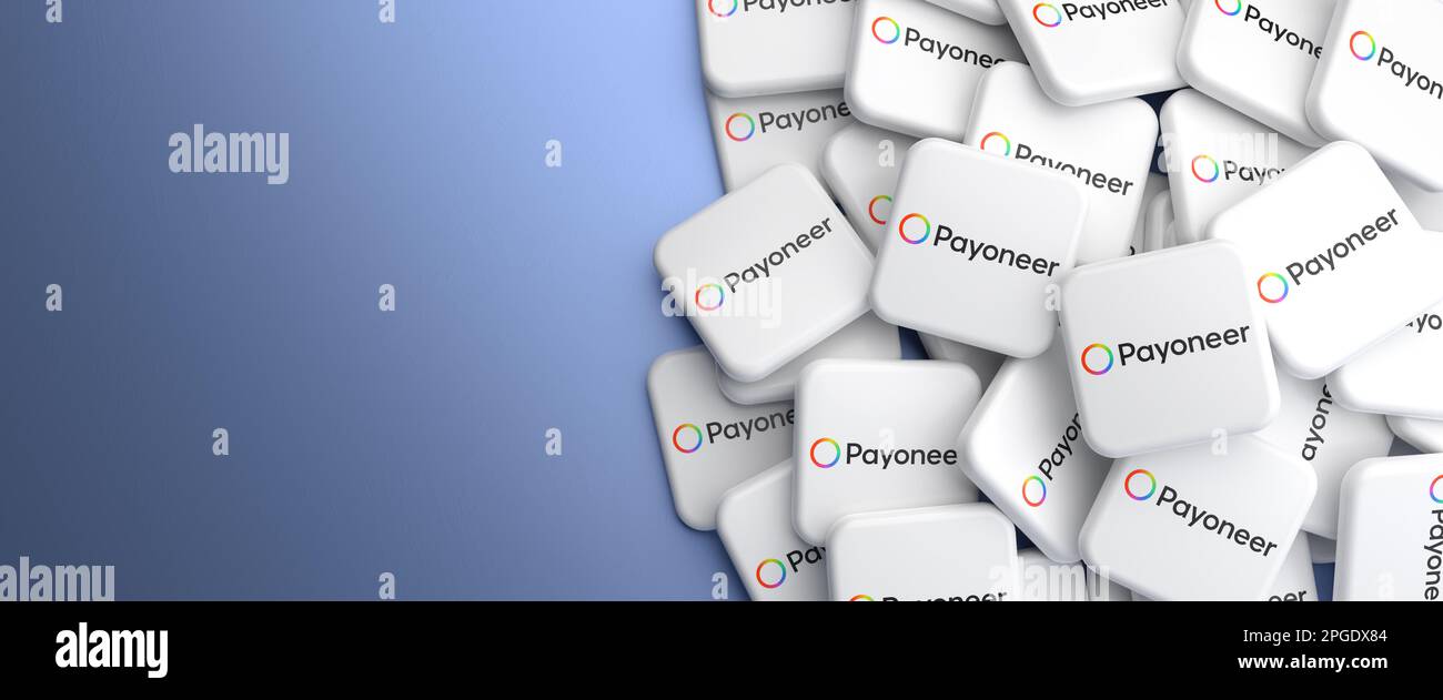 Logos Of The Payment Solution Payoneer On Heap On A Table Web Banner Format Copy Space Stock