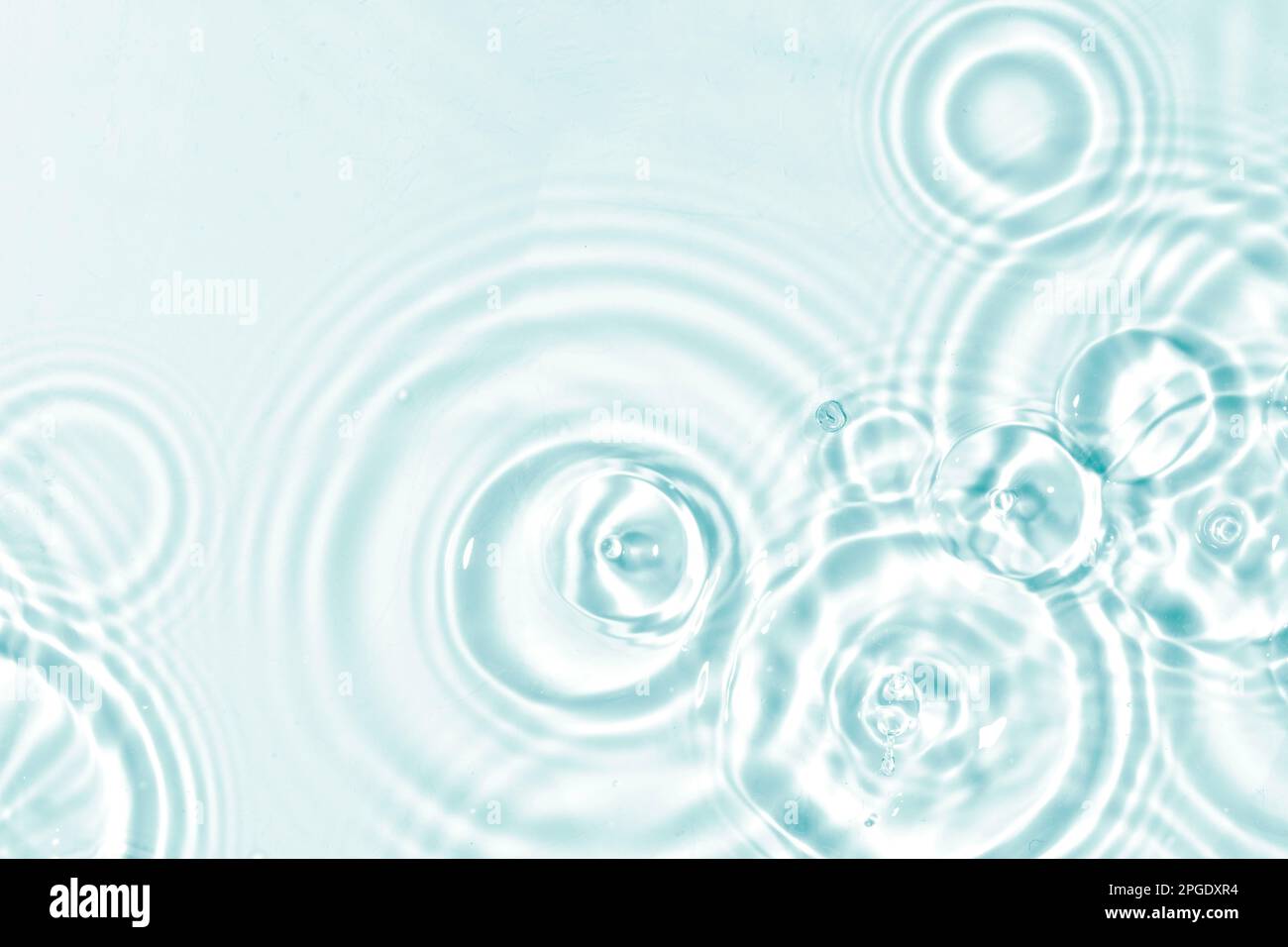 Abstract water, cosmetic background with rings, water surface. Spa ...