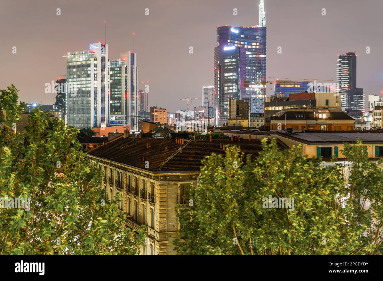 Milan, Italy skyline night view of illuminated skyscrapers at Gae ...