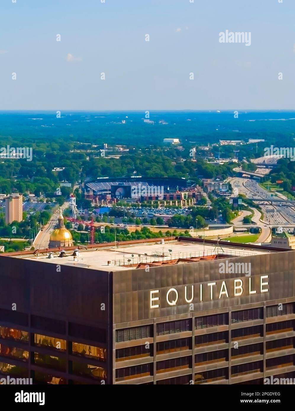A close up of the Equitable building with I-85 freeway in the ...
