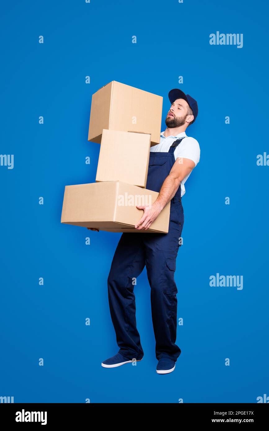 Full size body portrait of busy attractive deliver in blue uniform with ...