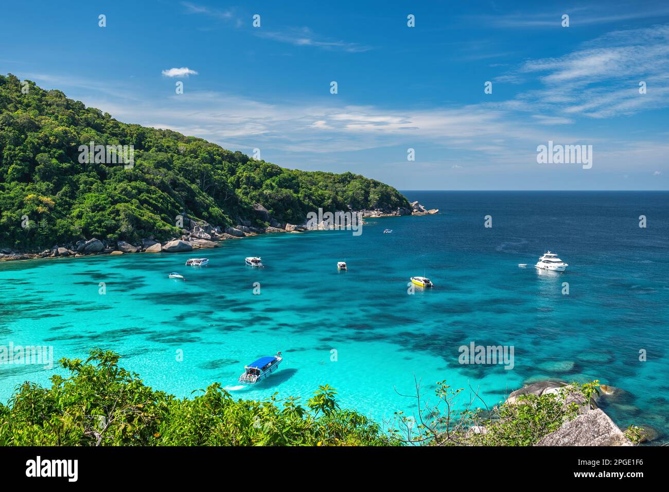 Tropical islands view of ocean blue sea water and white sand beach at Similan Islands from ...