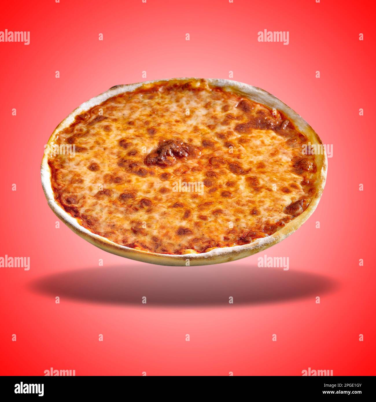 Floating Pizza Margherita on red radial gradient background Stock Photo ...