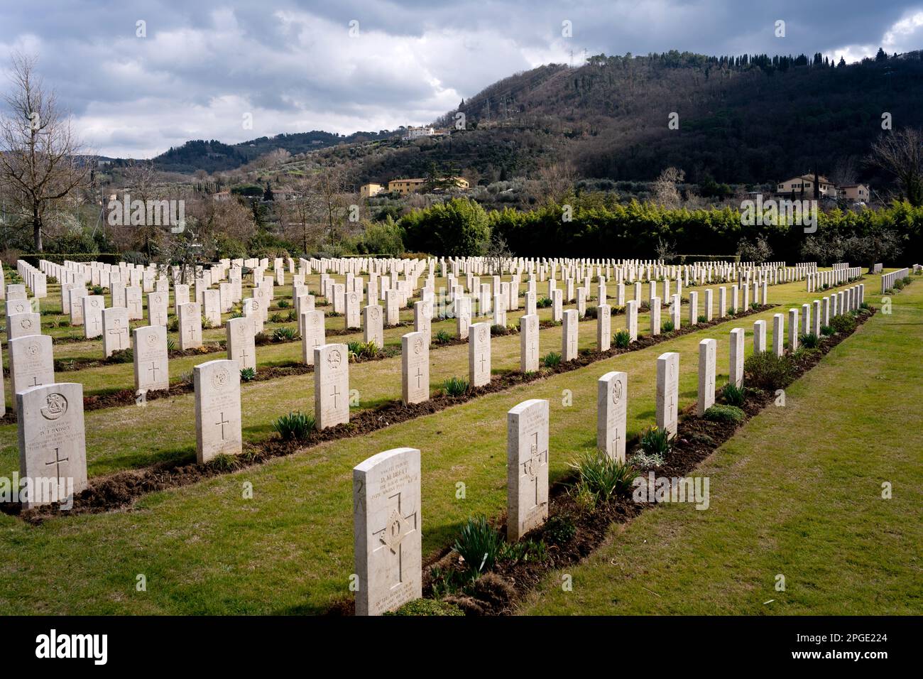 The Commonwealth War Graves Commission war cemetery near the river Arno ...