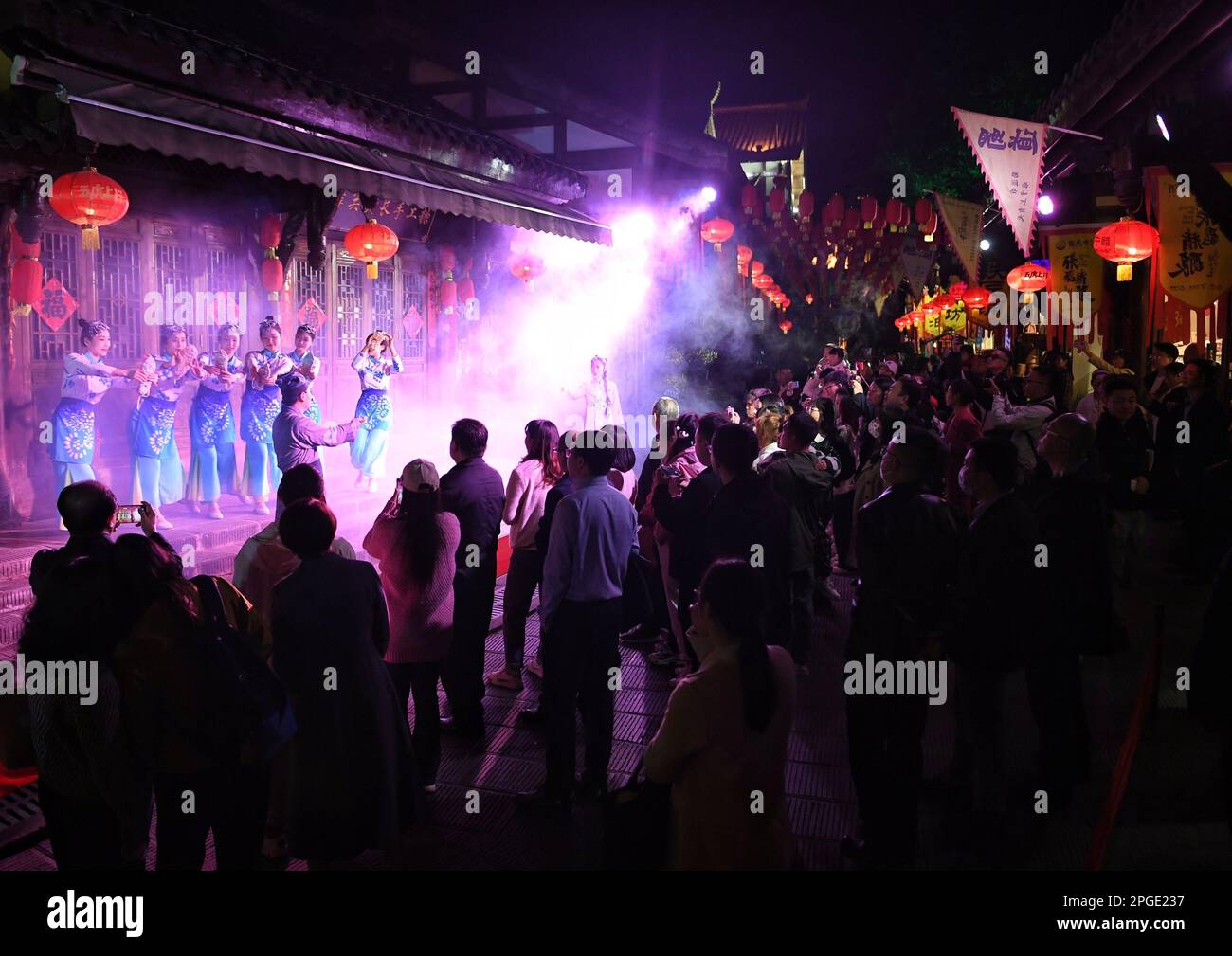 Nanchong, China's Sichuan Province. 20th Mar, 2023. Tourists watch a ...