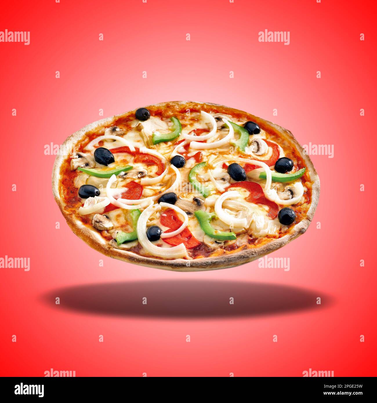 Floating Pizza vegetale on red radial gradient background Stock Photo ...