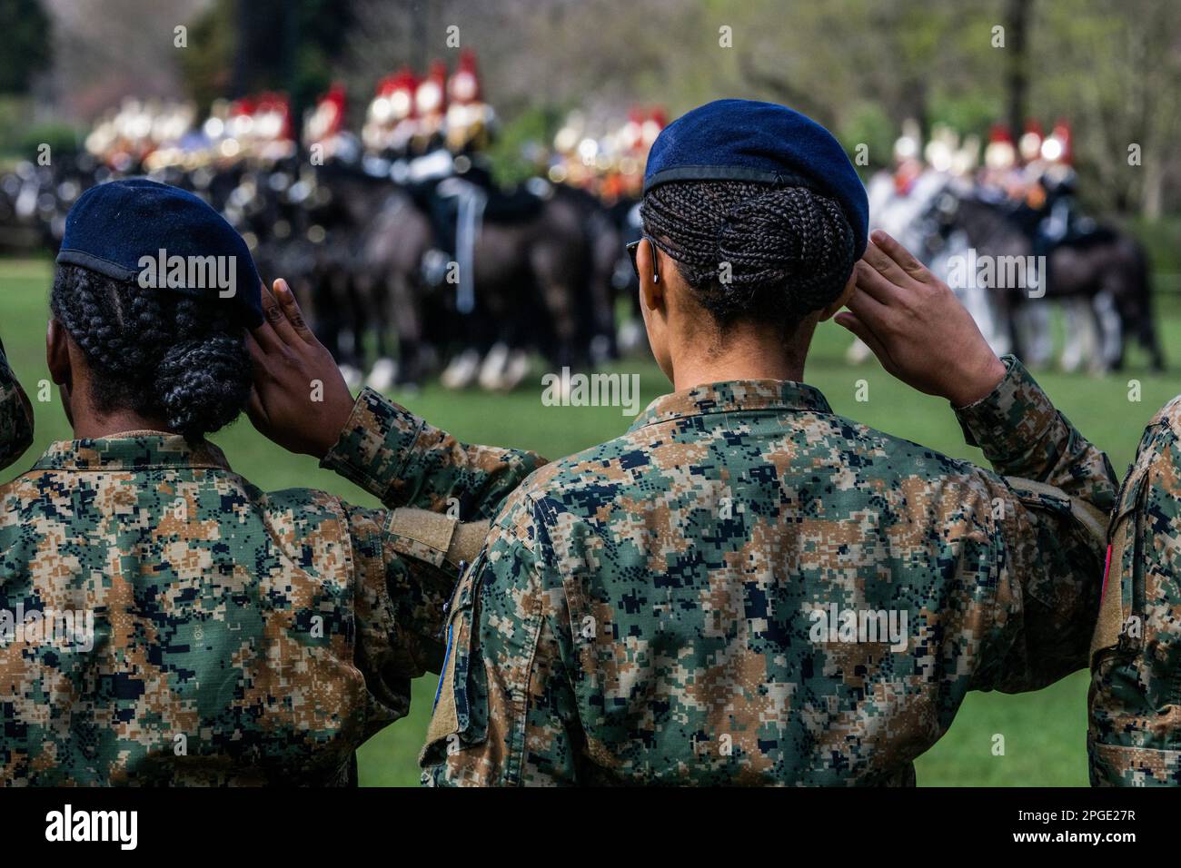 London, UK. 22 Mar 2023. A Jamaican Regiment on a visit watches and ...