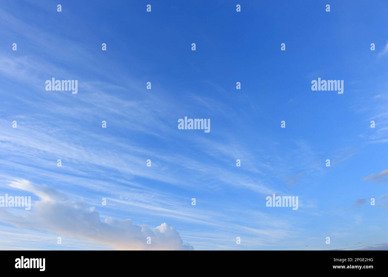 Clouds with diagonal stripes along the horizon Stock Photo - Alamy