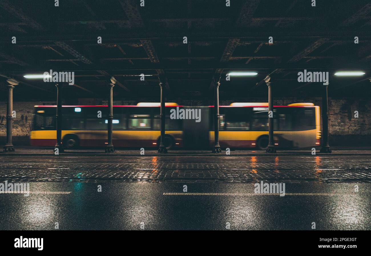 bus under the bridge at night Stock Photo - Alamy
