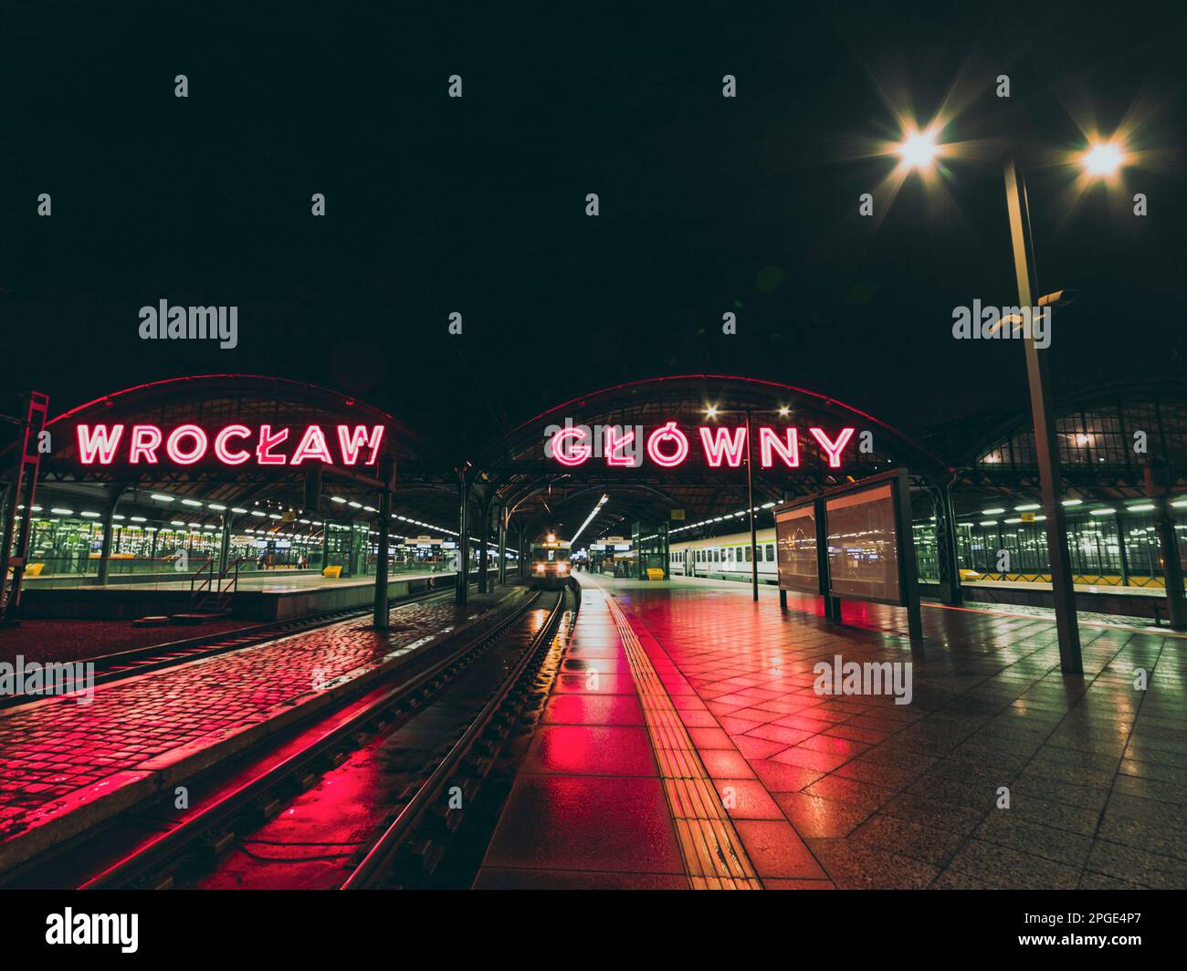 colorful lights on train station at night Stock Photo - Alamy