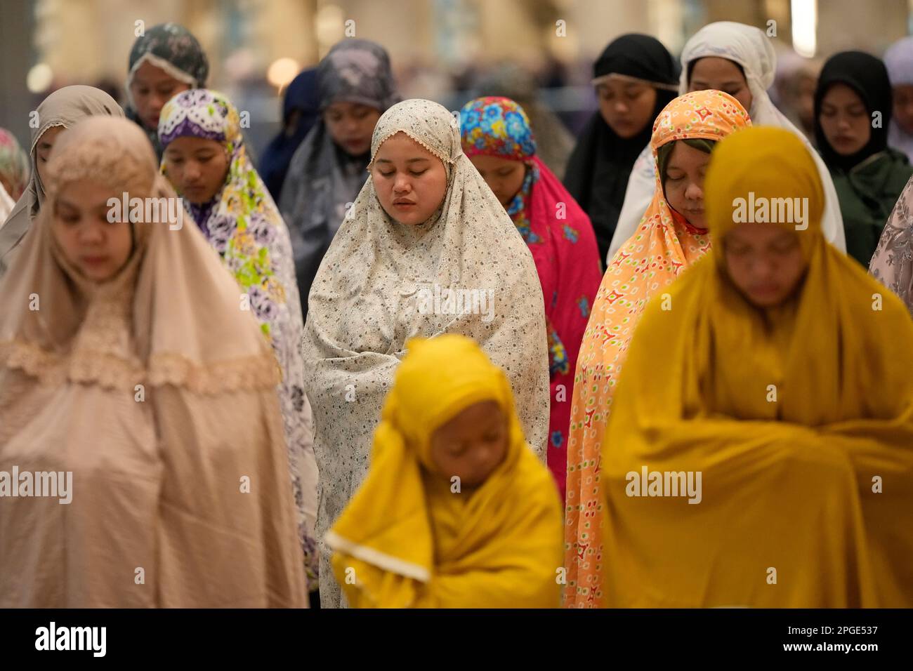 Indonesian Muslims perform an evening prayer called 'tarawih' marking ...