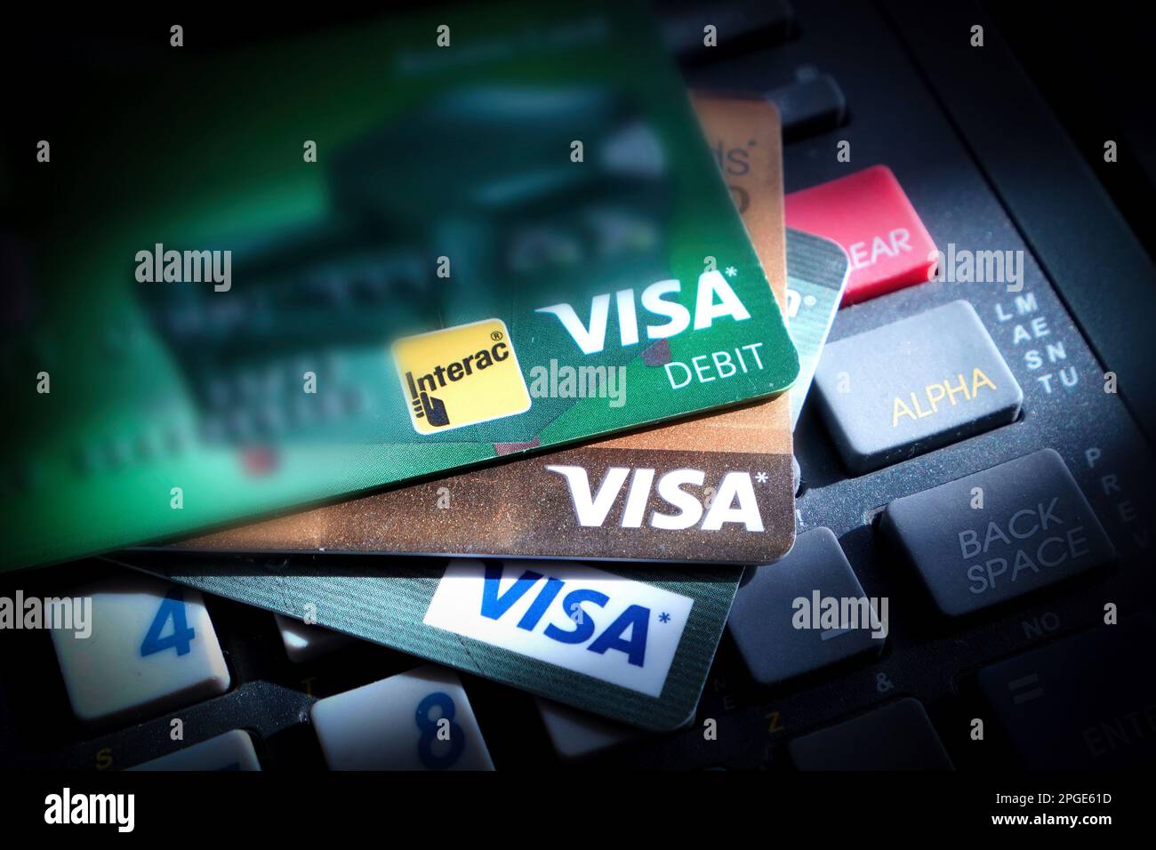 Credit and debit cards on laptop computer Stock Photo - Alamy