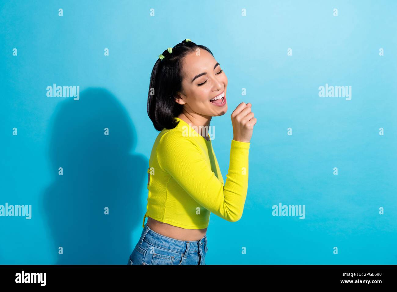 Profile photo of lovely positive girl arm hold imagine microphone sing ...