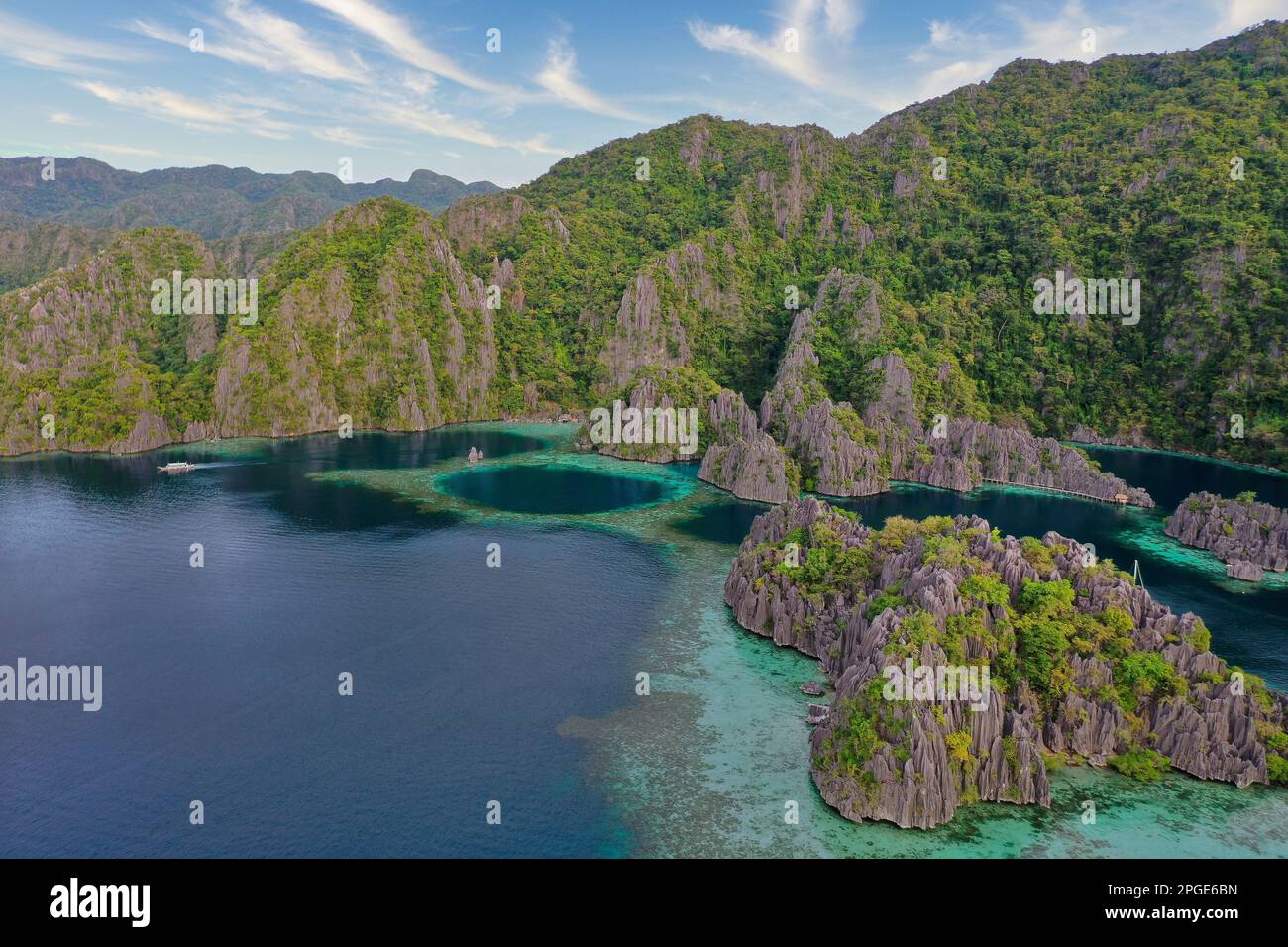 Panorama drone shot of majestic rocks in Coron, Palawan in the ...