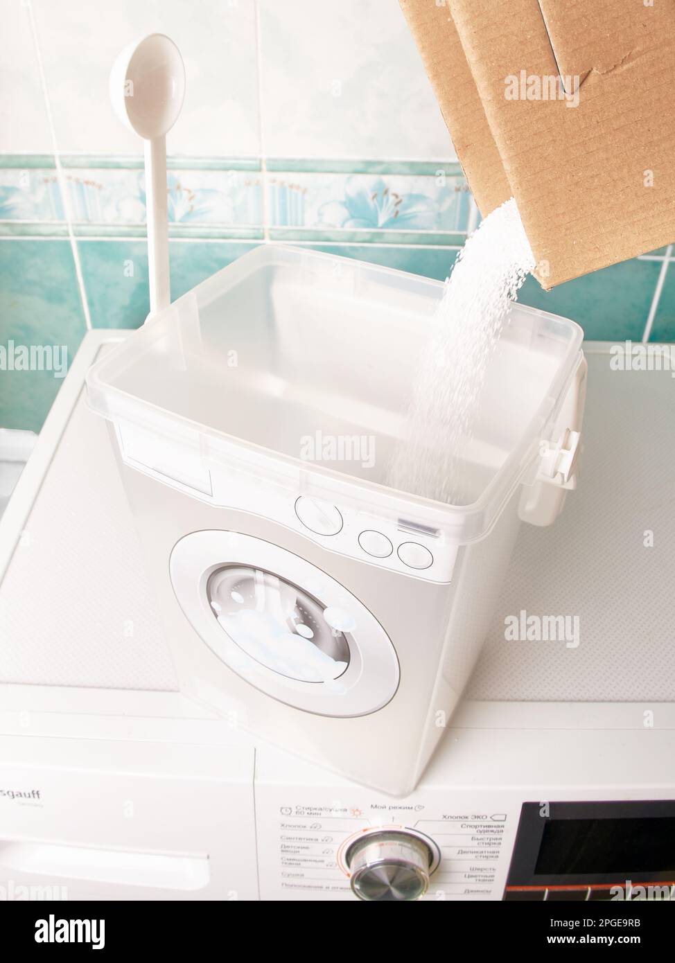 Containers for storing washing powder for different fabrics on a ...