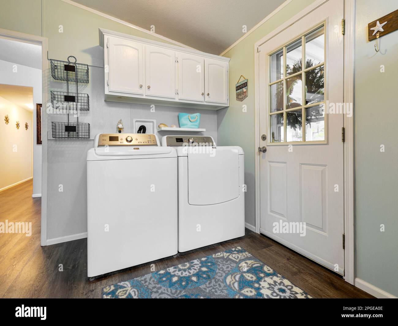 Modern residential laundry room interior Stock Photo - Alamy
