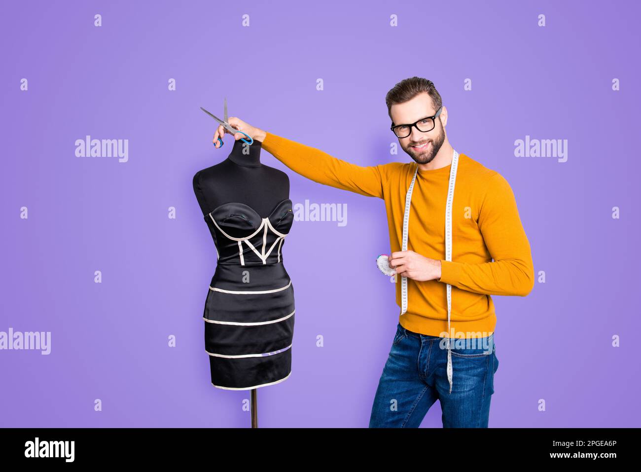Portrait of famous, attractive dressmaker with centimeter on neck in ...