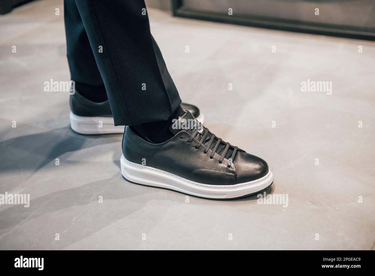 Close up view of man's legs in modern new luxury black shoes Stock ...
