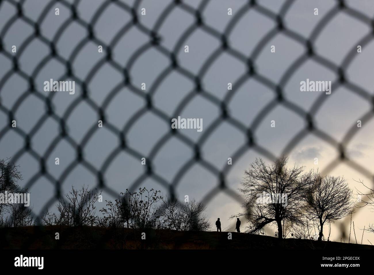 Indian Army Soldiers are standing alert on a mountain, keeping vigil ...