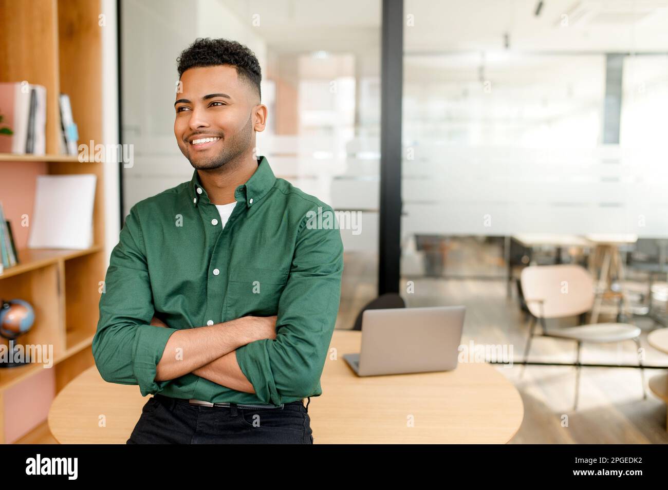 Thriving indian male employee stands hi-res stock photography and ...