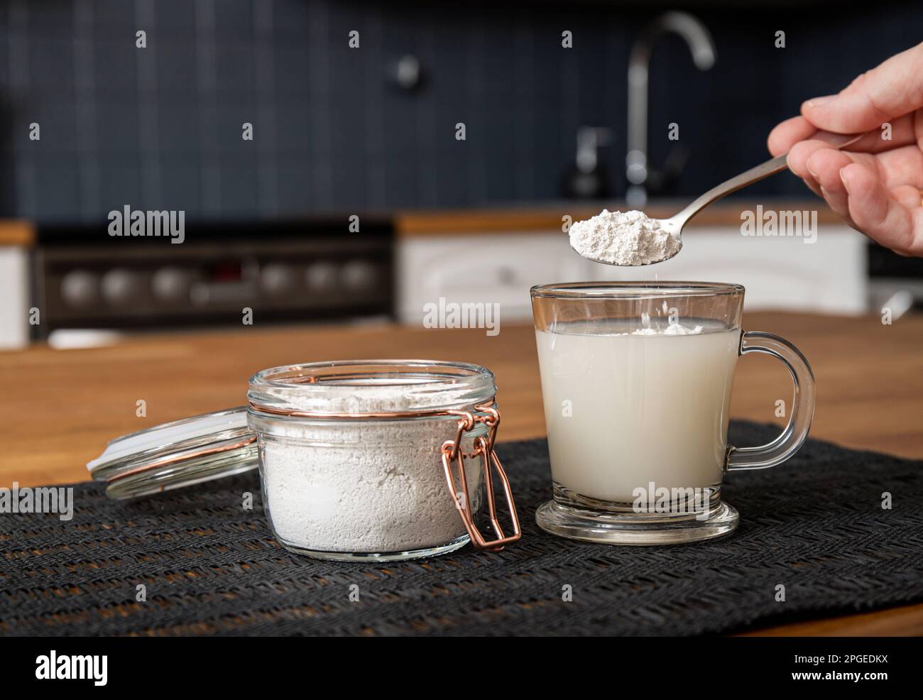 Diatomaceous earth also known as diatomite mixed in glass of water ...