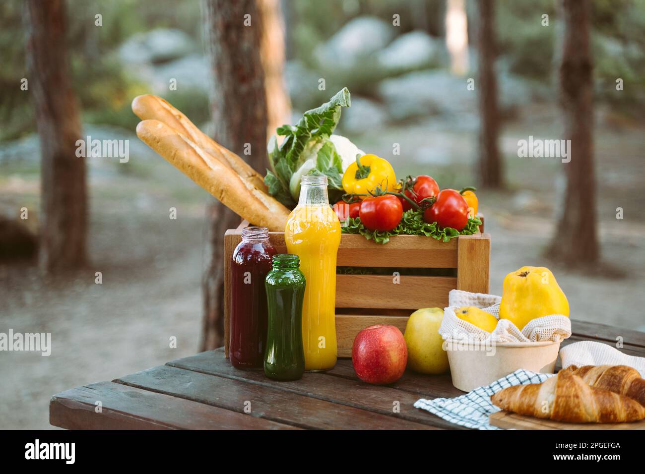 Wooden crate organic farmland vegetables, bread baguettes, fruits ...