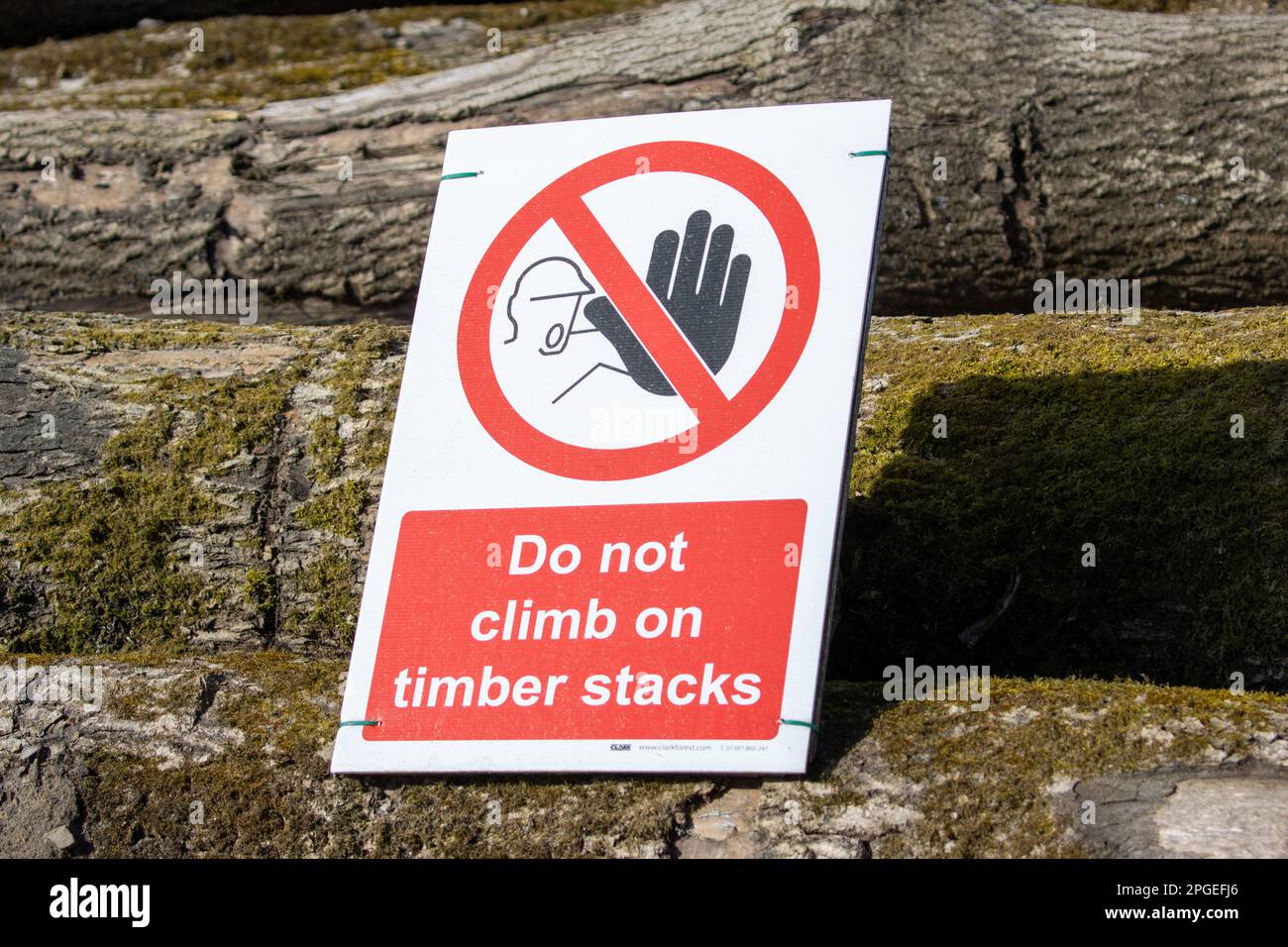 Close up of a red warning sign Do not climb on timber stacks, UK Stock ...