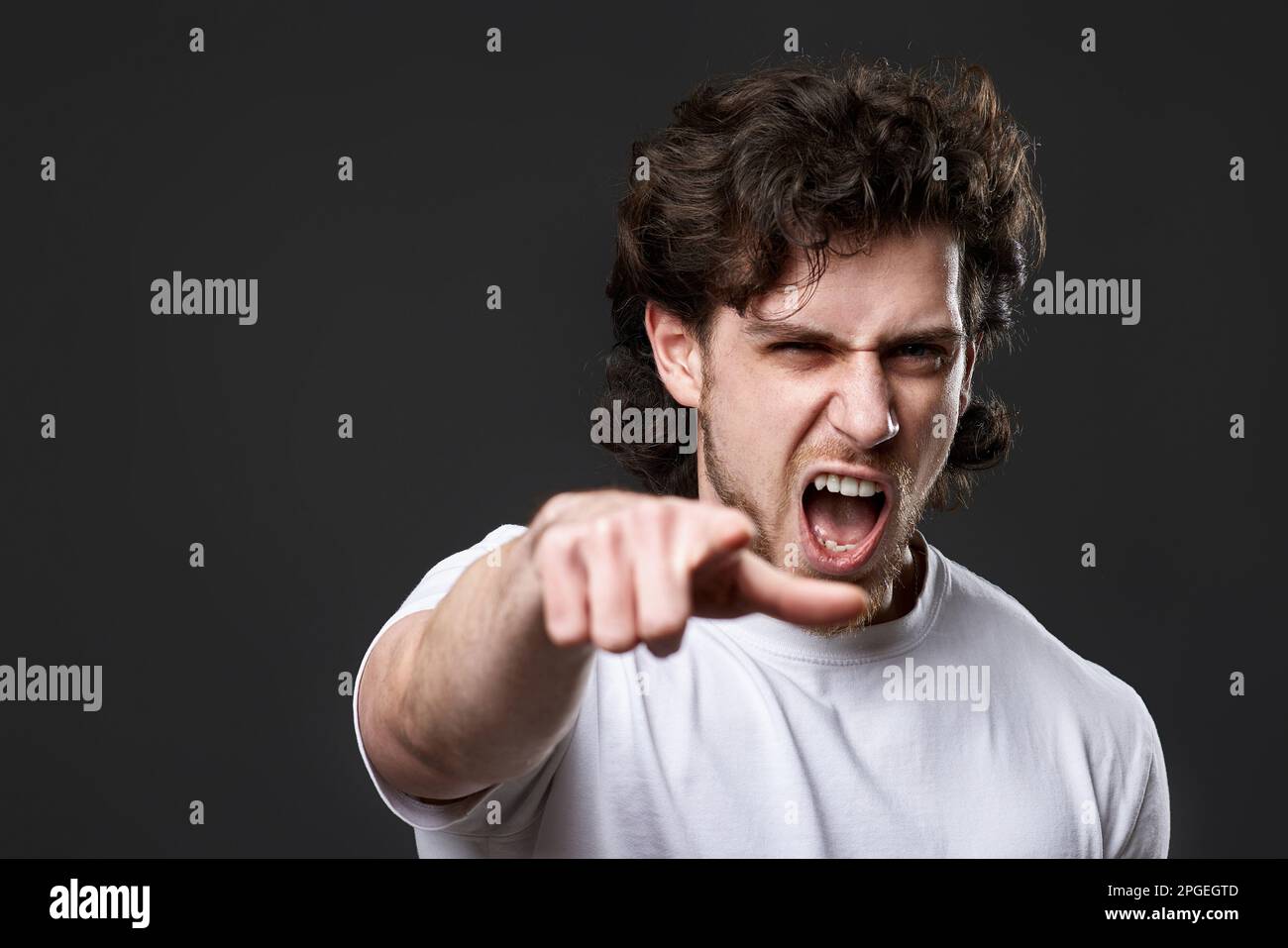 Angry guy yelling finger pointing hi-res stock photography and images ...