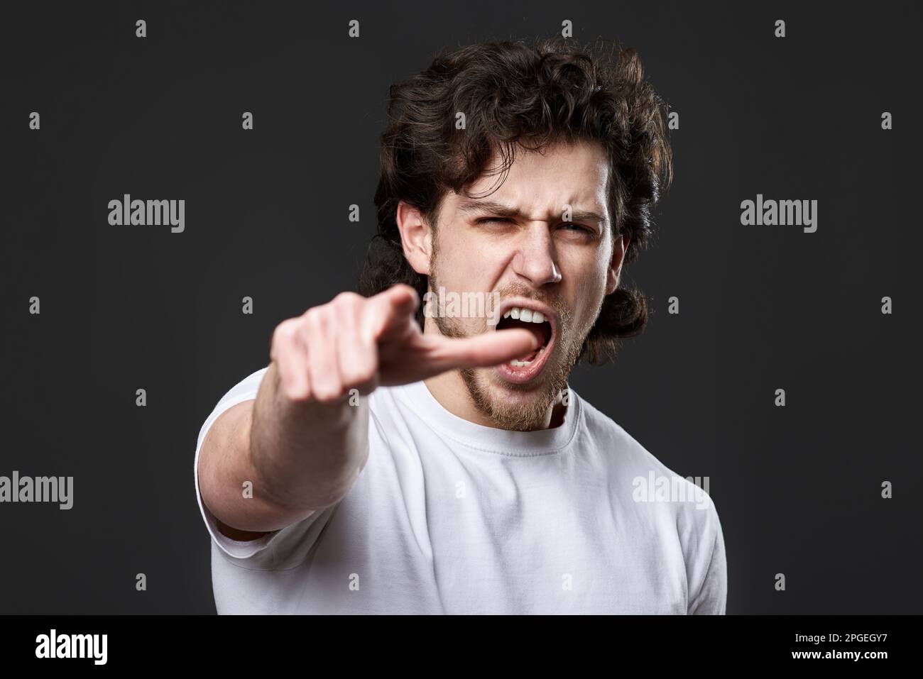 Angry guy yelling finger pointing hi-res stock photography and images ...