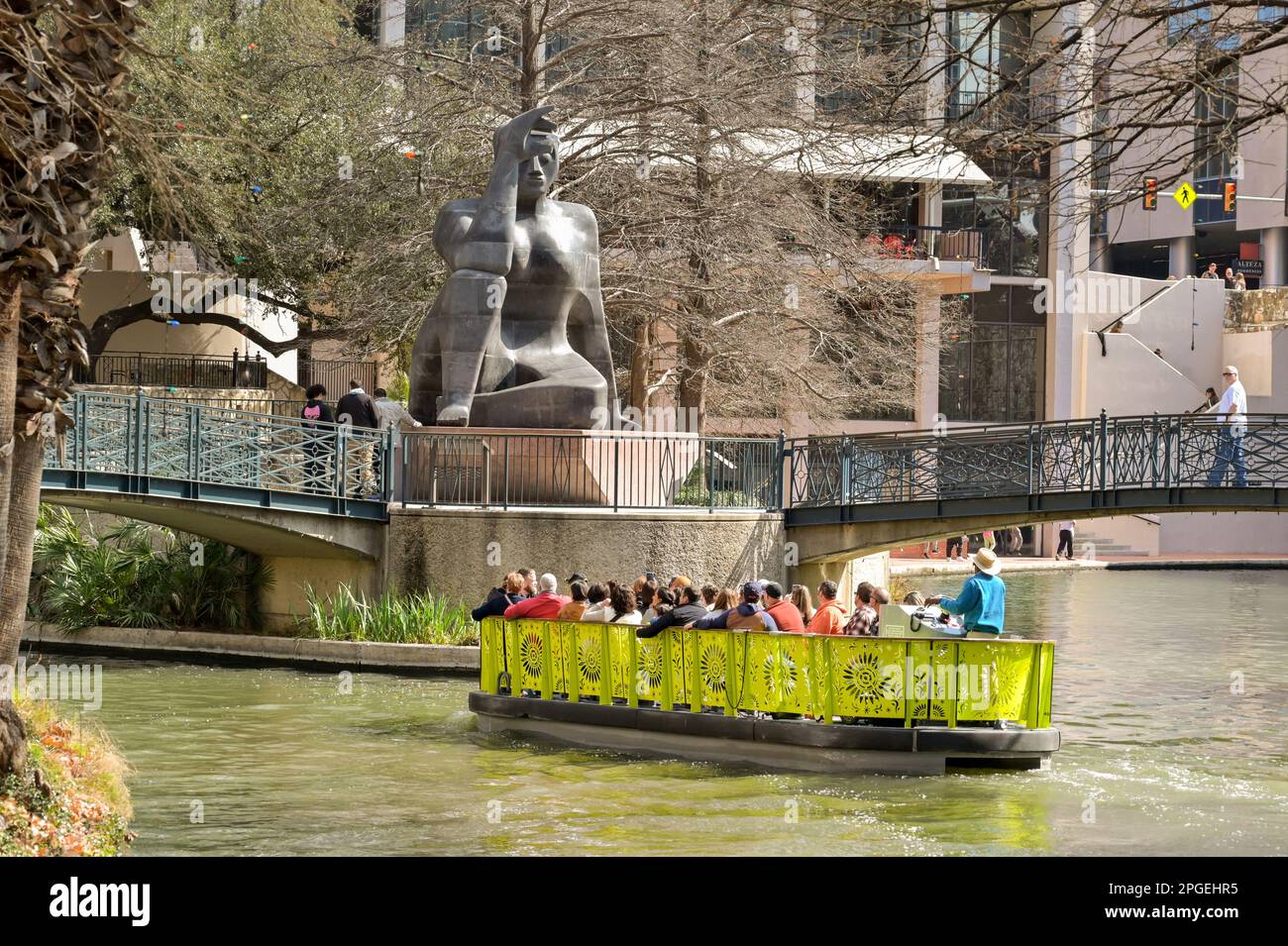San Antonio, Texas, USA - February 2023: Visitors on a river boat ...