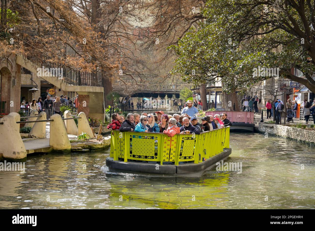 San Antonio, Texas, USA - February 2023: Visitors on one of the river ...