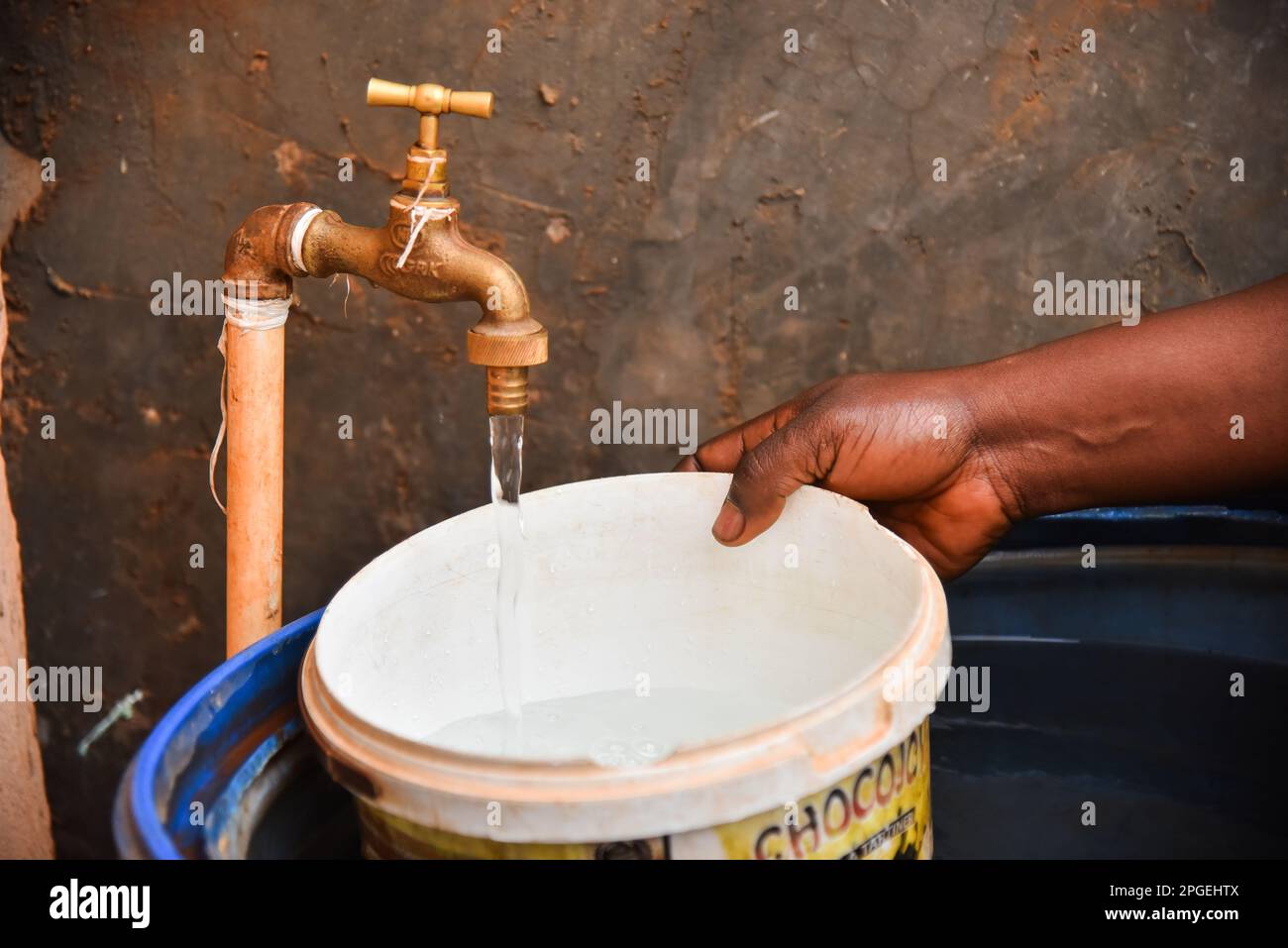 Yaounde, Cameroon. 2nd Mar, 2023. Carine Nem draws water from the tap ...