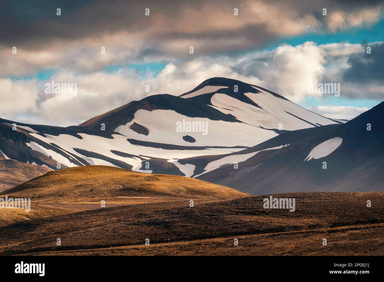 Majestic volcanic mountain and hill in remote wilderness on geothermal ...