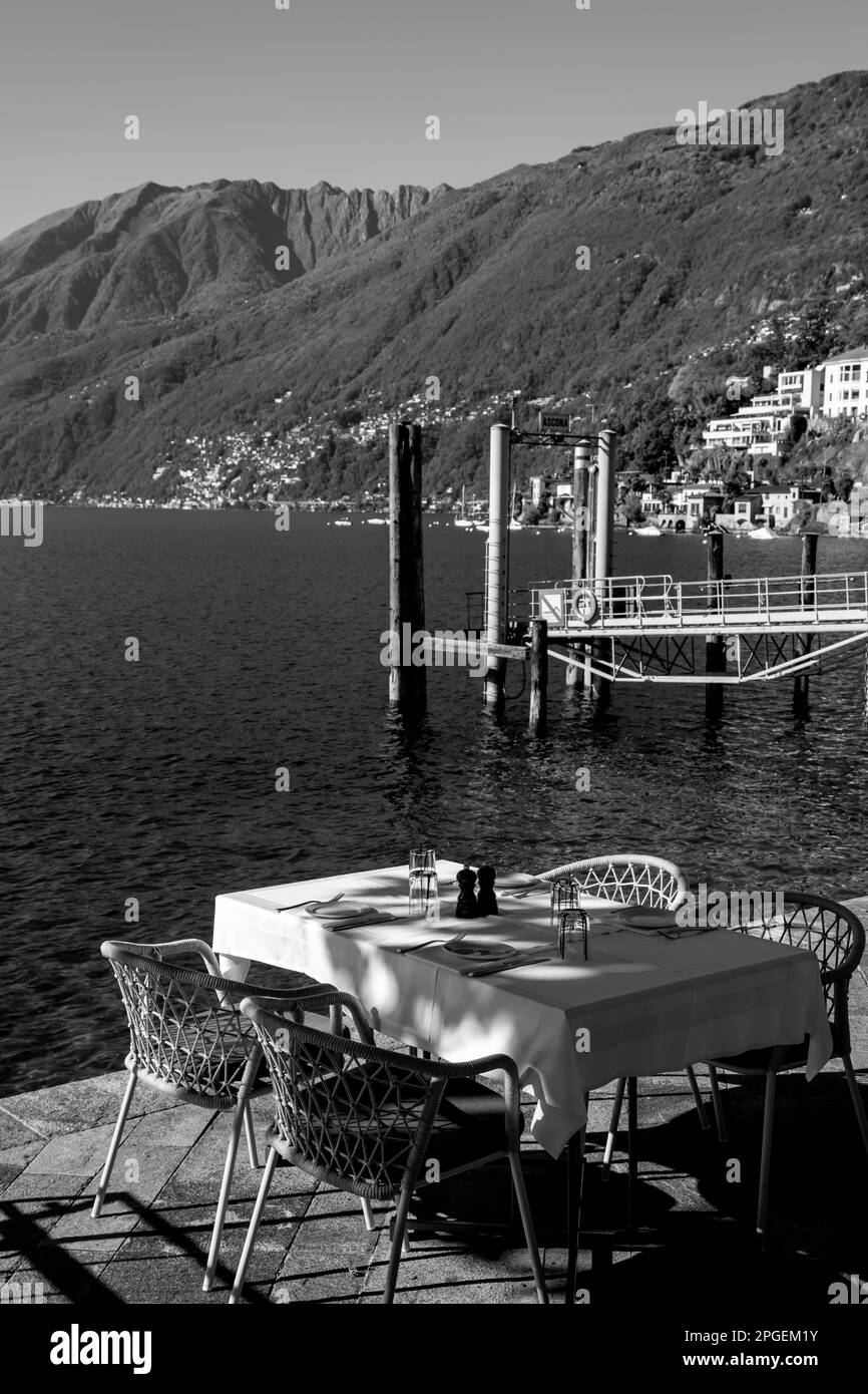 Restaurant Table on Waterfront on Lake Maggiore with Mountain View in a ...