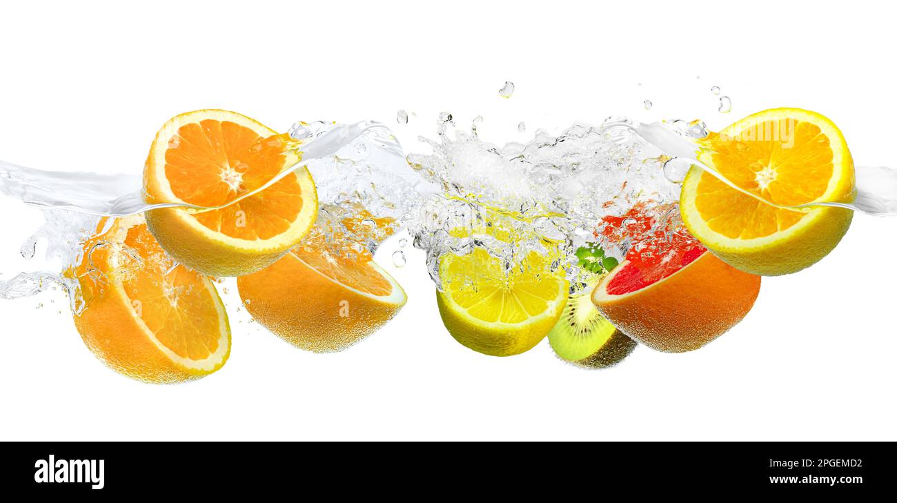 Fruits mix splashing into clear water on a white background Stock Photo ...
