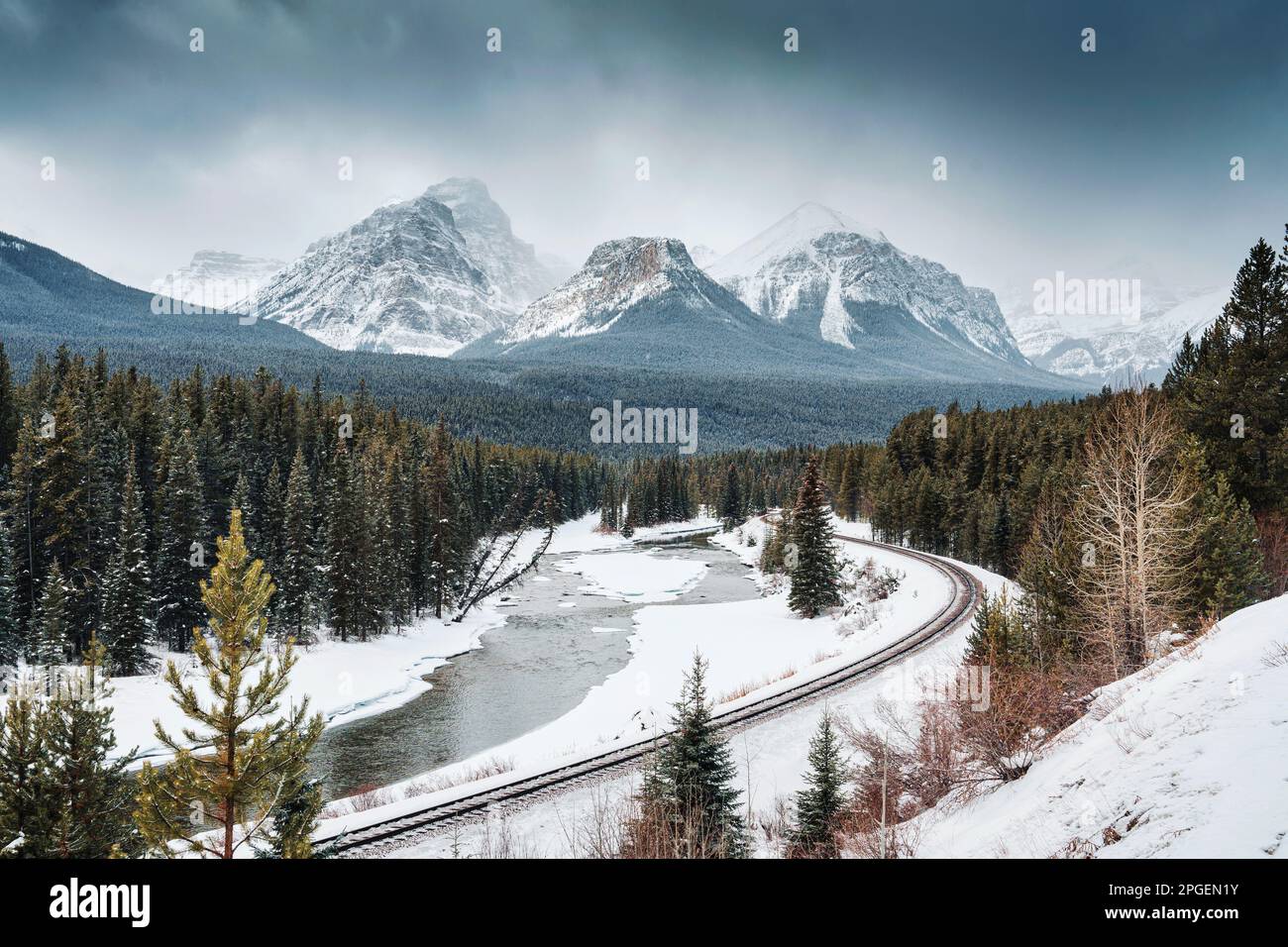 Viewpoint of Morants Curve with railway passing through bow valley and rocky mountains in winter ...